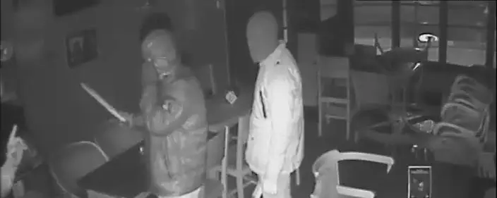 Police hunt two men who beat staff with pieces of wood during attempted raid on Altrincham bar ...