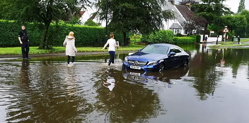 Pictures and videos: New flood warning issued for Timperley Brook as ...